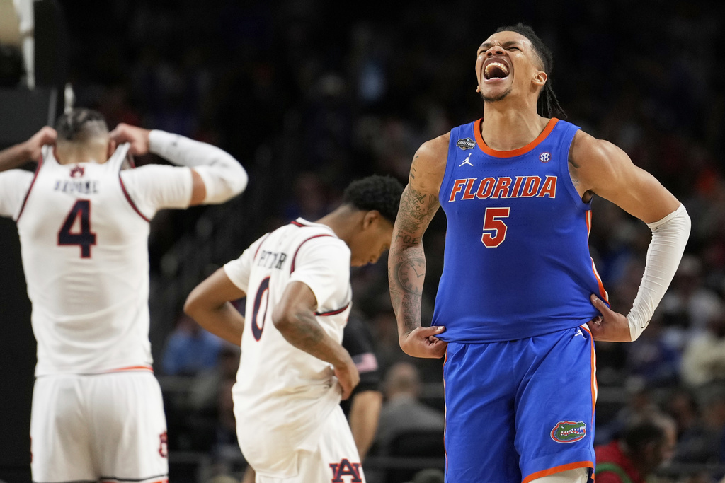 Florida defeats Auburn 79-73, advances to national title game
