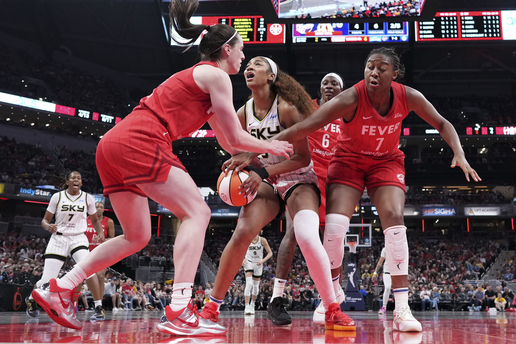 Clark’s triple-double leads Fever past Sky 93-58 as tempers flare after hard foul in 3rd quarter