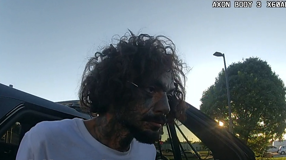 Tulsa man arrested after stabbing, carjacking in parking lot