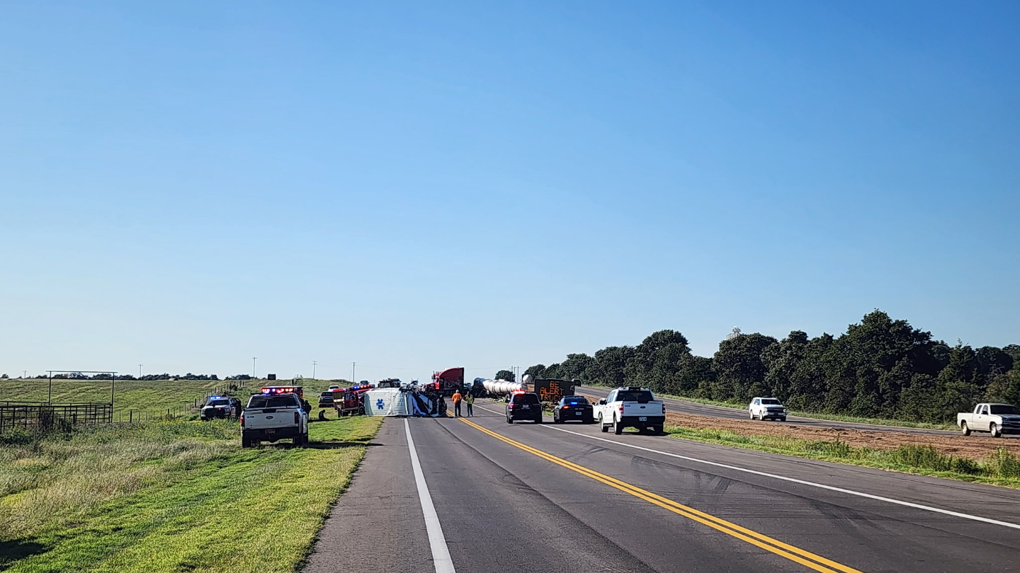 1 dead, multiple injured in crash between ambulance and semi-truck